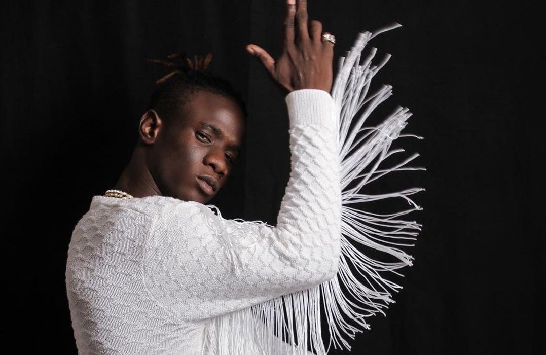 Gambian Superstar Jizzle Outdoors Feel-Good "Work & Pray" Visuals